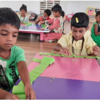 Green day Activity: Tearing the green crepe paper to make collage in a ...